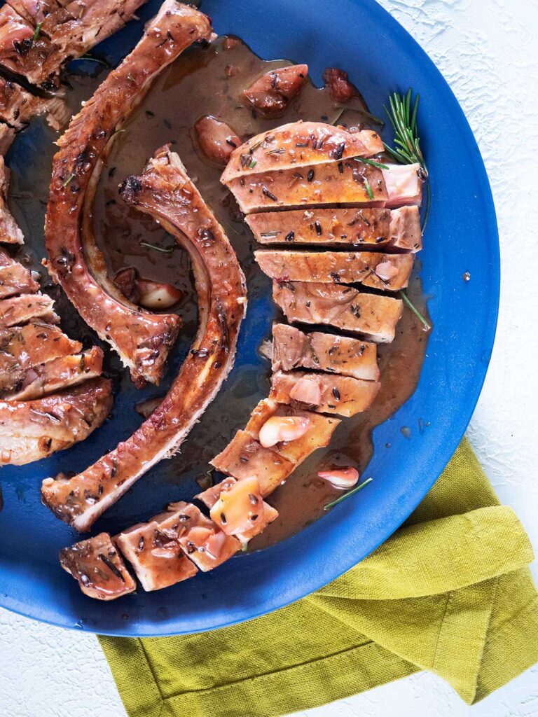 Tomahawk Pork Chops with Orange, Garlic, & Rosemary | Belly Rumbles