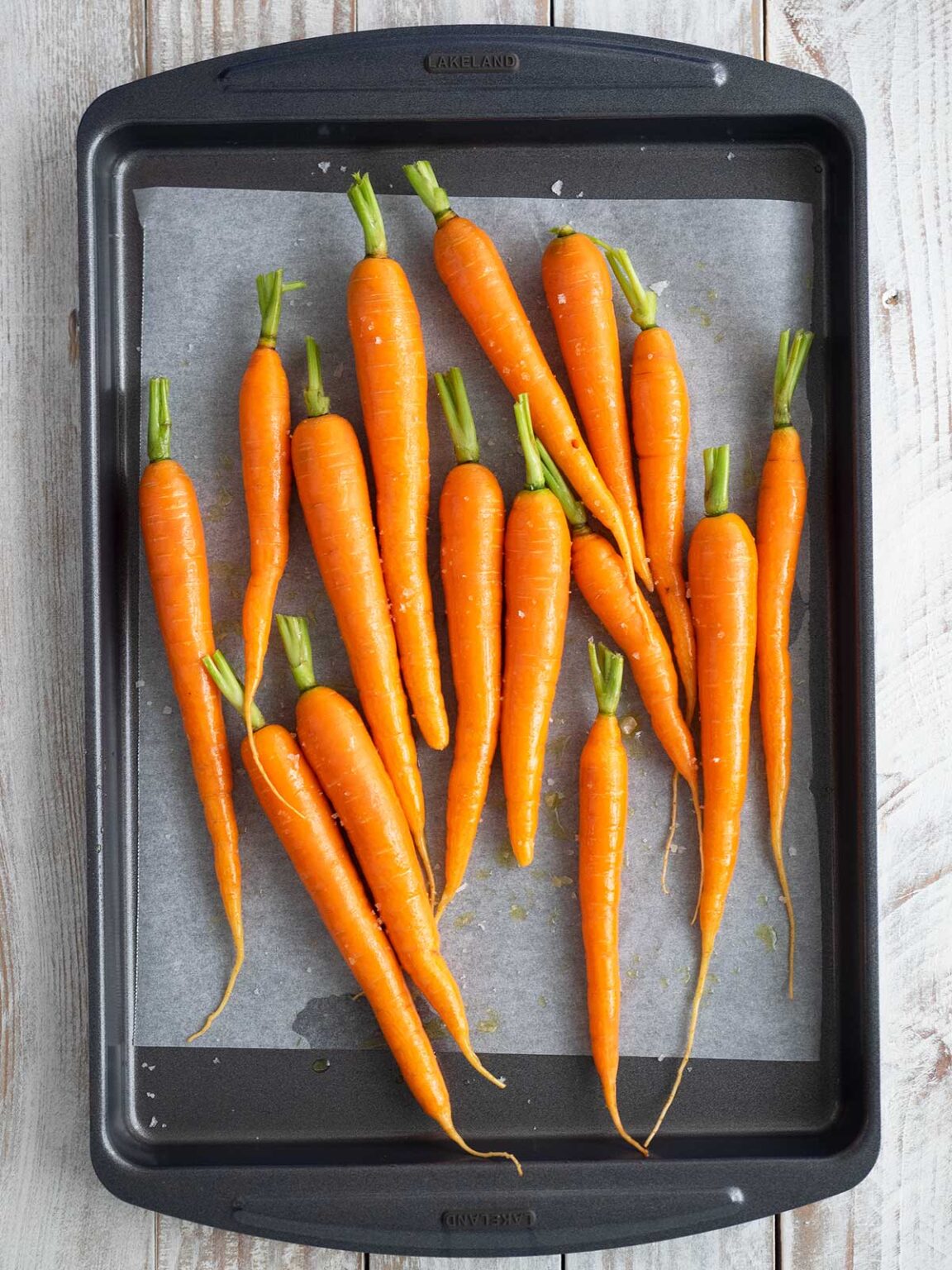Roasted Dutch Carrots with buttery honey almonds - Belly Rumbles