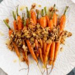 Roasted Dutch Carrots with buttery honey almonds - Belly Rumbles