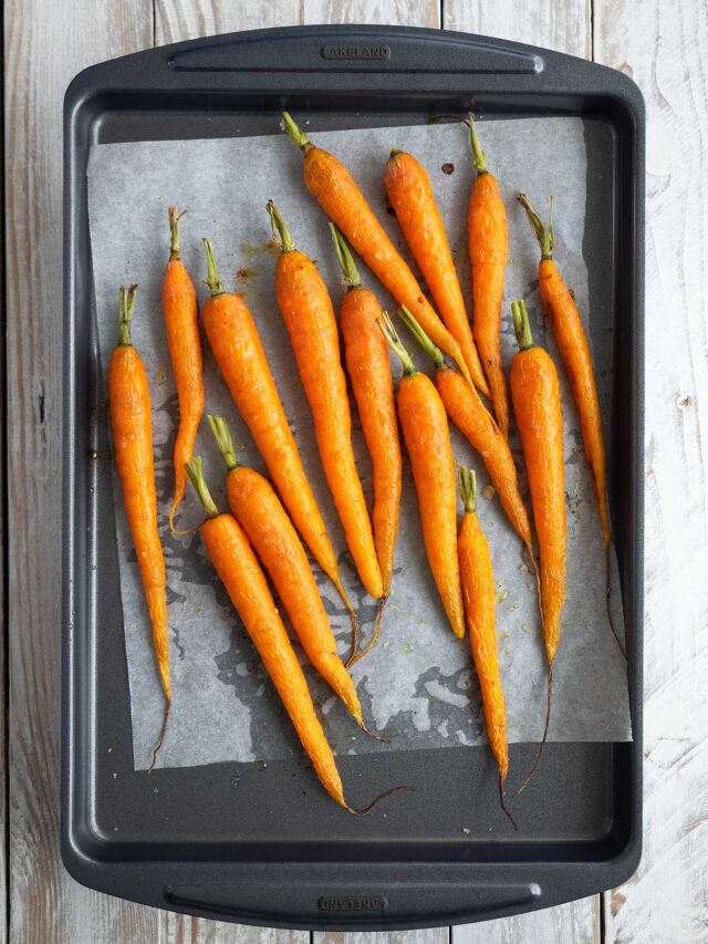 Roasted Dutch Carrots with buttery honey almonds - Belly Rumbles